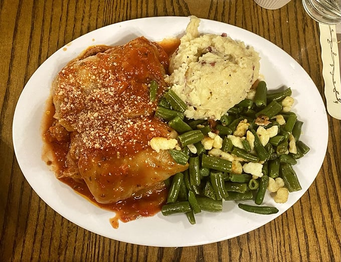 Comfort food doesn't get more authentic than this – tender cabbage rolls bathed in savory sauce with sides that would make any Oma nod in approval.