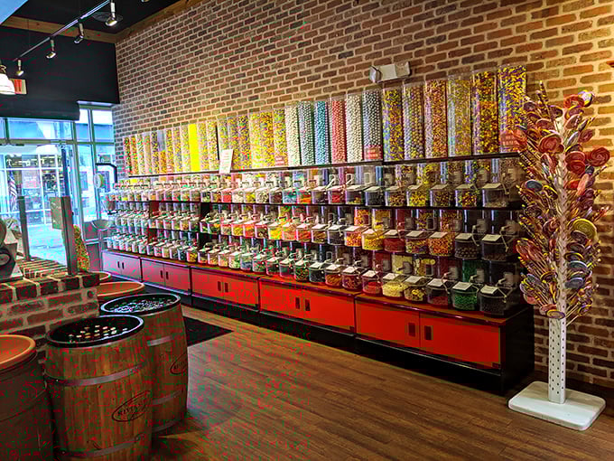 A candy lover's fever dream where self-control goes to die—rows of colorful treats that make adults revert to their eight-year-old selves with alarming speed.