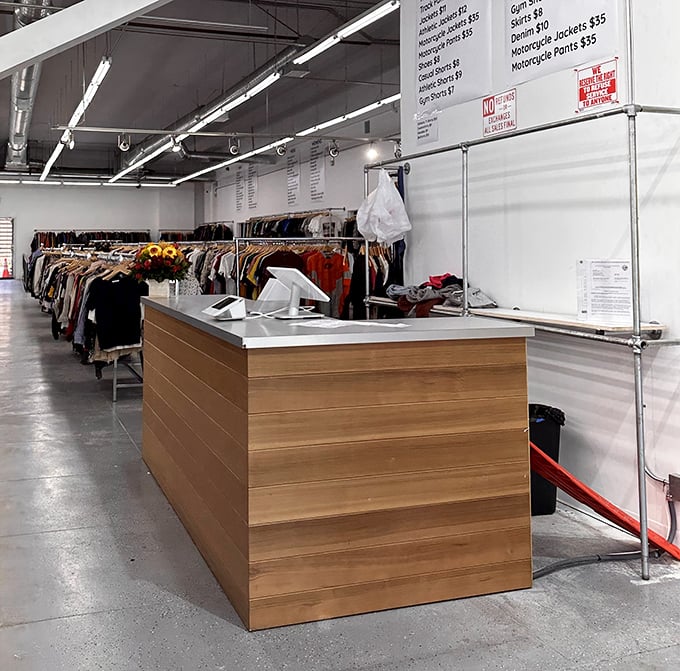 The checkout area—where dreams are tallied and wallets breathe sighs of relief. That wooden counter has witnessed countless victory purchases.