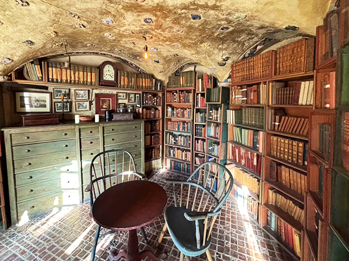 This cozy library nook feels like the secret heart of Fonthill, where books and knowledge are literally built into the walls.