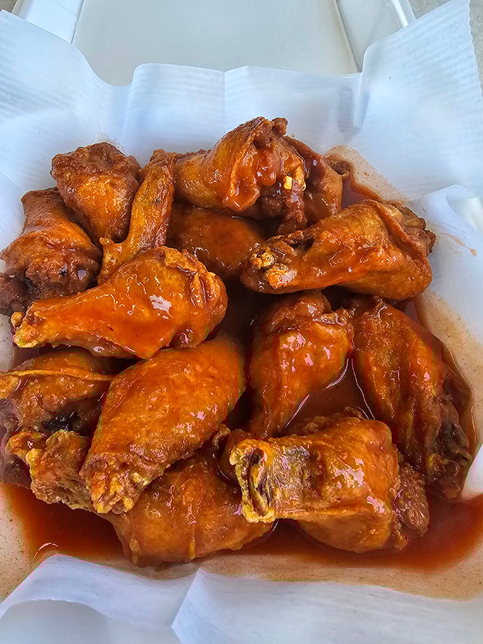 These wings aren't trying to reinvent the wheel with fancy sauces—they're just perfectly fried, gloriously sauced, and ready for their close-up.
