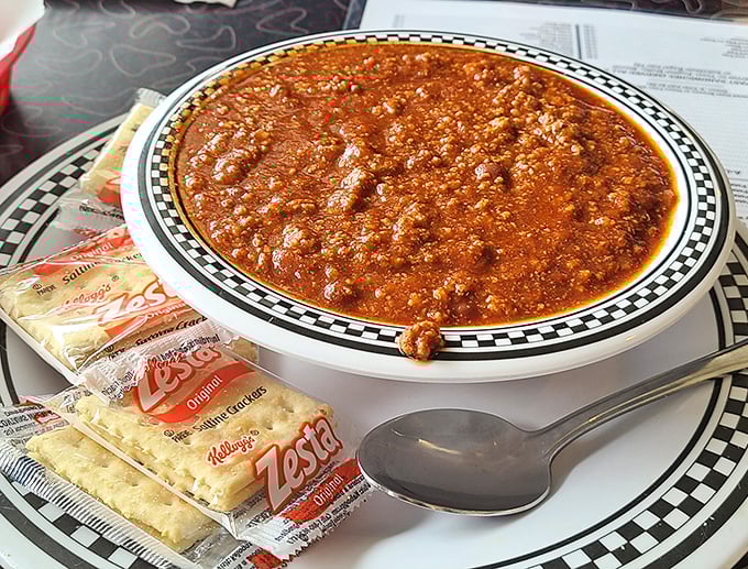 This isn't just chili—it's a warm hug in a bowl, complete with those little oyster crackers that disappear too quickly.