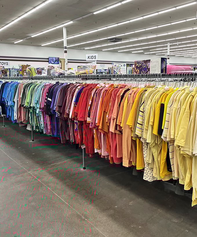 The rainbow of clothing racks at Red White & Blue isn't just organized—it's a color-coded treasure map leading straight to your next favorite shirt.