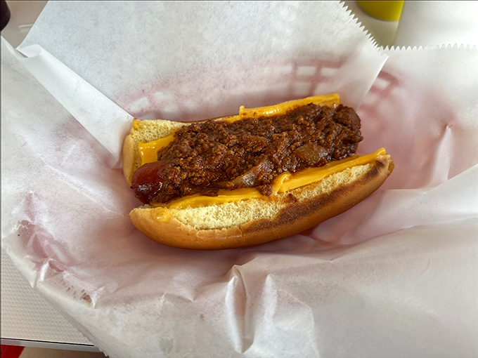 Bobo's burger with all the fixings sits alongside golden fries on that iconic checkerboard paper—a chess game where everyone wins.