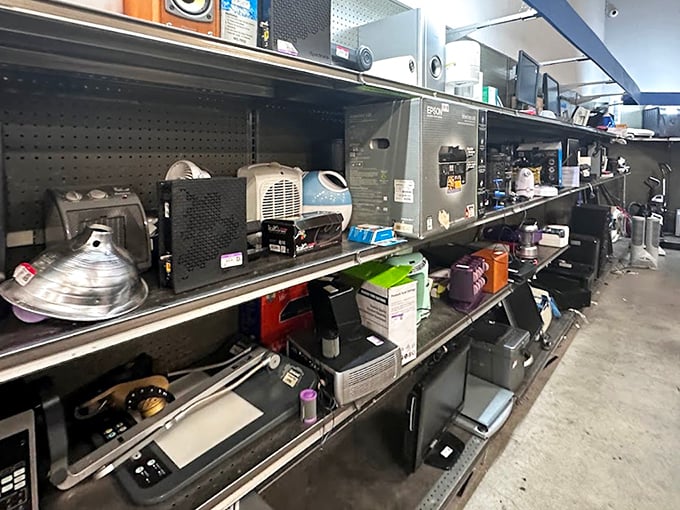 Electronic time capsules line these shelves. That microwave might be older than some dating apps, but probably more reliable.