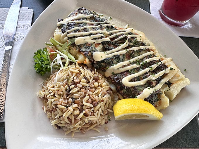When fish meets rice, magic happens. That drizzle of sauce isn't just garnish—it's the conductor of this culinary orchestra.