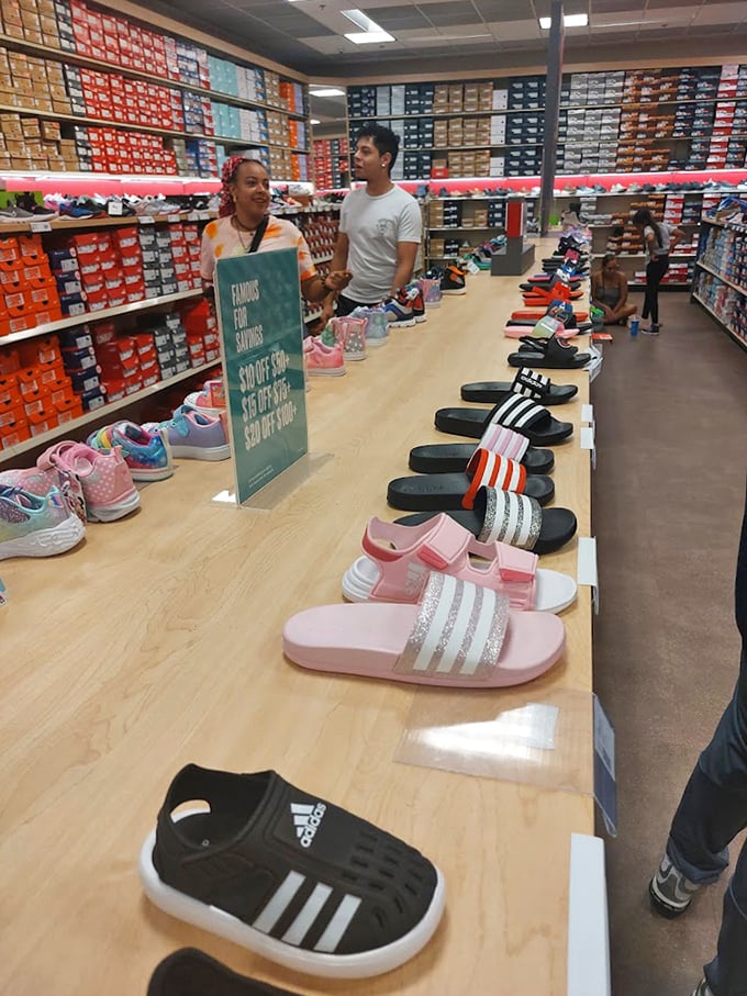 The Adidas store displays a rainbow of footwear options—because life's too short for boring shoes.
