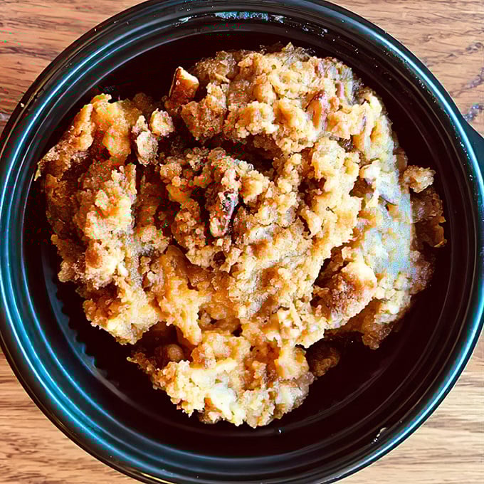 Sweet potato casserole that's had a crunchy makeover. This isn't your grandmother's side dish—unless your grandmother was secretly a barbecue genius.