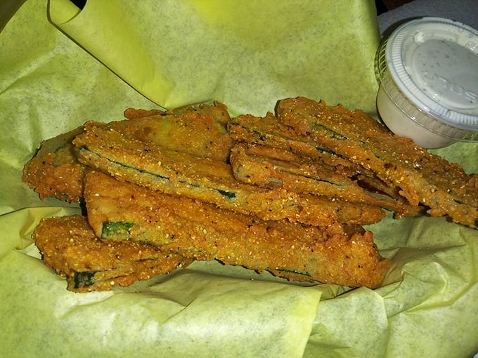 Fried zucchini sticks that make eating vegetables feel like cheating on your diet – crispy, golden, and utterly addictive with that creamy dipping sauce.