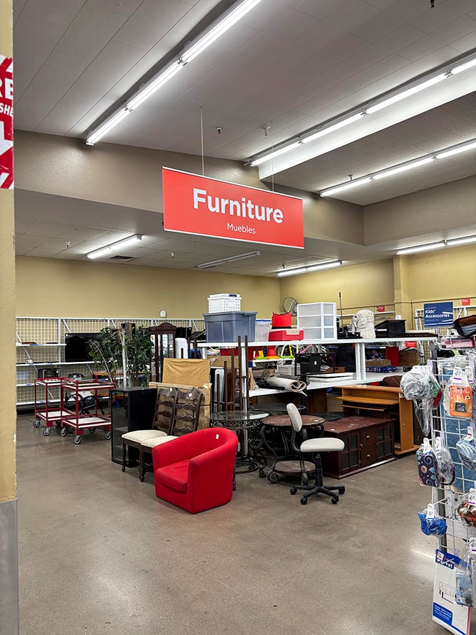 The furniture section—where office chairs mingle with accent tables in a social gathering of pre-loved home essentials.