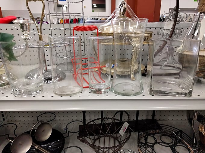 Clear vessels with unclear histories—each glass container waiting for a second life holding flowers, cocktails, or simply catching afternoon light.