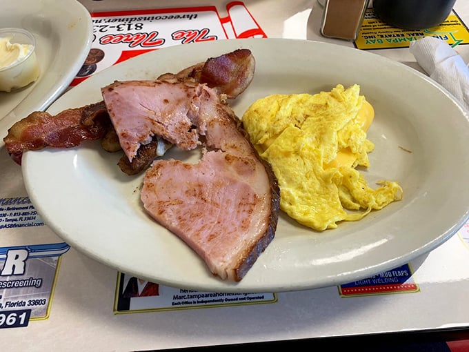 Ham steak and eggs: the breakfast equivalent of a handshake agreement. Straightforward, honest, and exactly what you came for.
