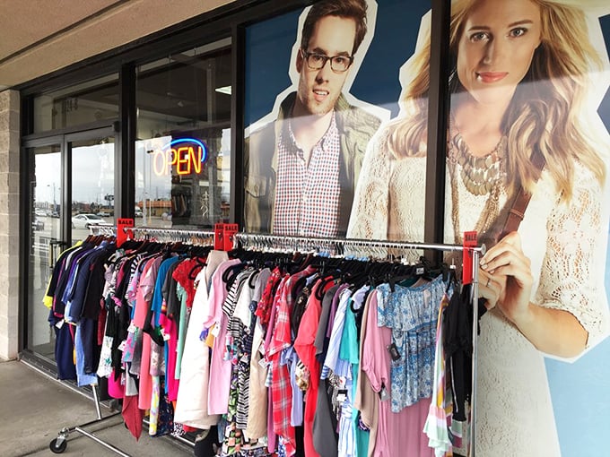 The storefront beckons with colorful clothing racks outside – like a fashion lemonade stand where the refreshment comes in fabric form.
