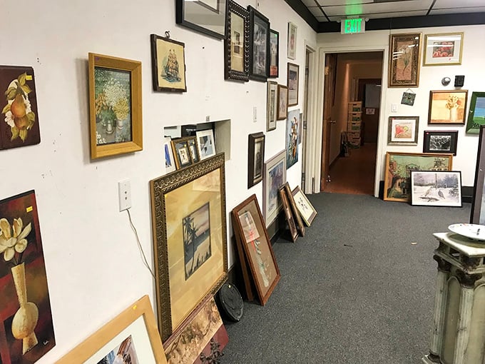 The art section – where someone's discarded painting becomes your living room's conversation piece for less than the price of dinner.