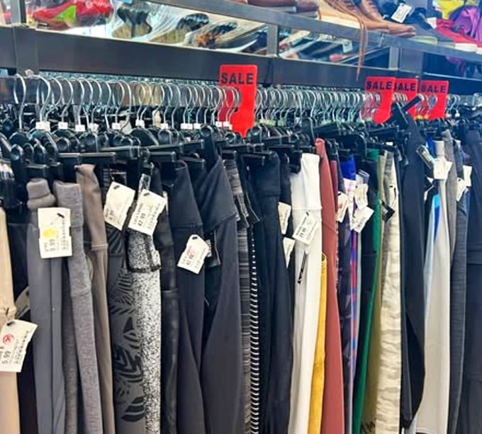Sale racks that actually contain clothes you'd want to wear. The red tags signal bargains that make your wallet breathe a sigh of relief.