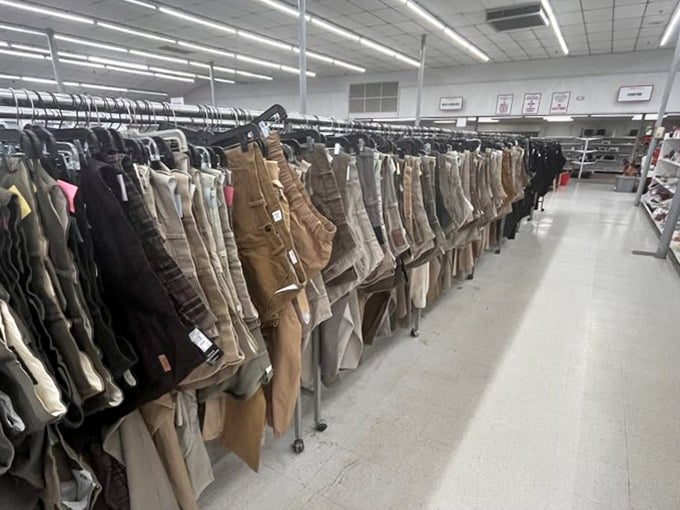 Khakis and corduroys stand at attention, a battalion of pants ready for duty in new homes and fresh adventures.