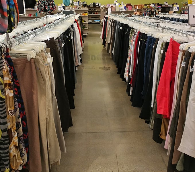 The pants corridor—a denim lover's dream or nightmare, depending on how you feel about decision paralysis. Every length, every style, every decade represented.