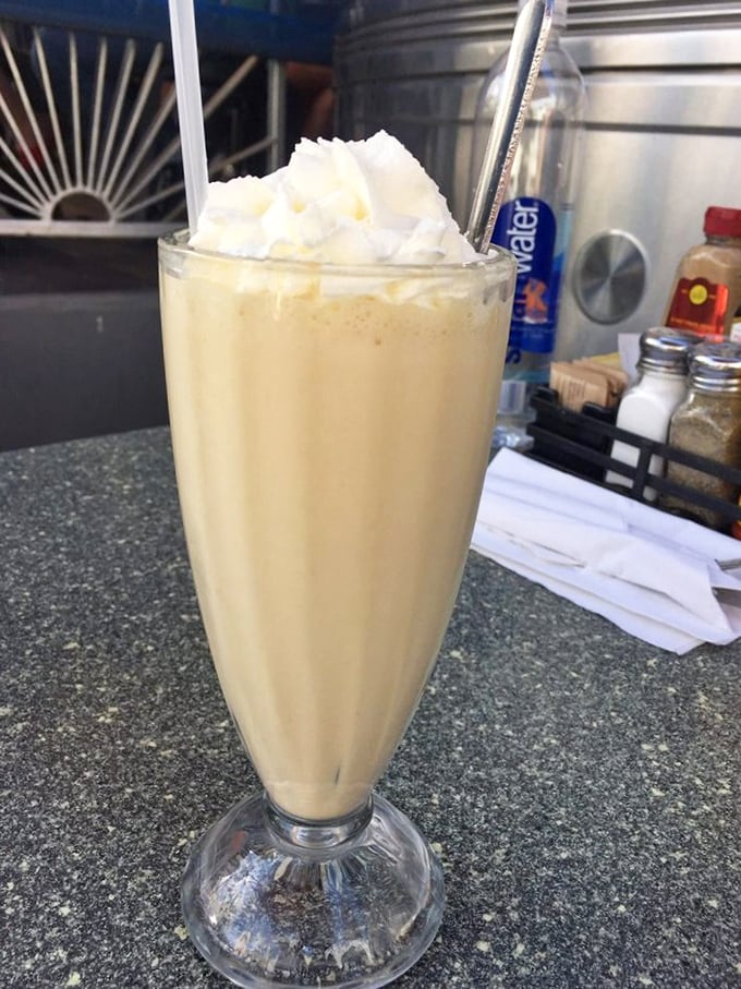 The peanut butter milkshake stands tall and proud – a creamy monument to indulgence that makes dieting seem like a concept from another dimension.