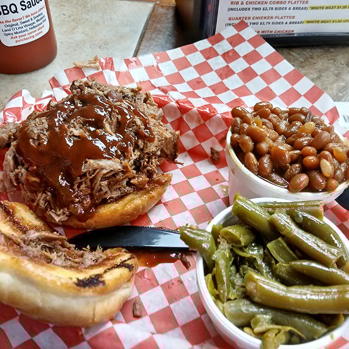 The pulled pork sandwich—where smoke meets sweet in perfect harmony. That sauce-soaked bun should be considered a Florida state treasure.