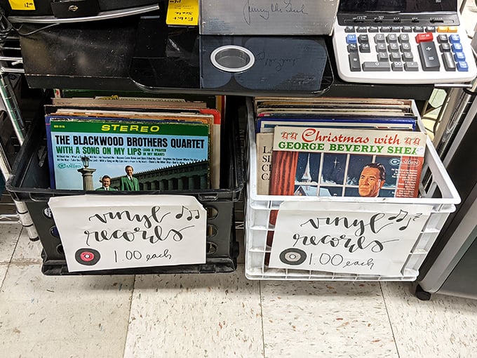 Vinyl treasures at a dollar each—where George Beverly Shea's Christmas album might become your new ironic party soundtrack or genuine December favorite.