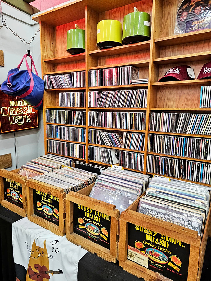 Vinyl heaven for record collectors. Those wooden crates hold someone's abandoned soundtrack—ready to become your next musical obsession.