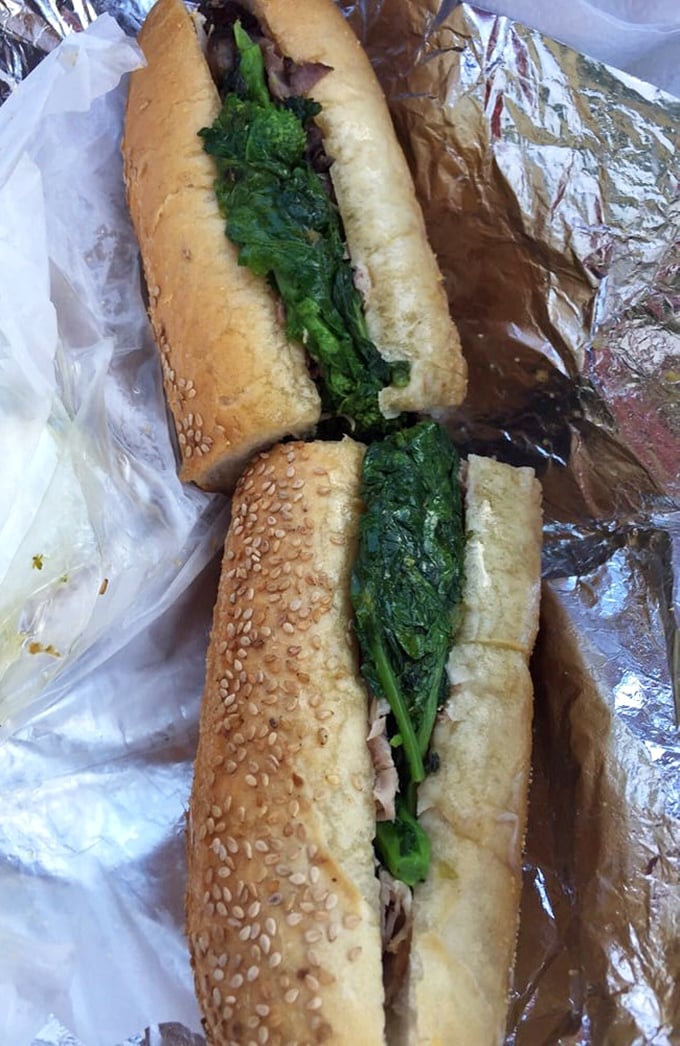 The roast pork with broccoli rabe—Philly's unsung sandwich hero. Tender meat meets bitter greens in a romance that puts most rom-coms to shame.