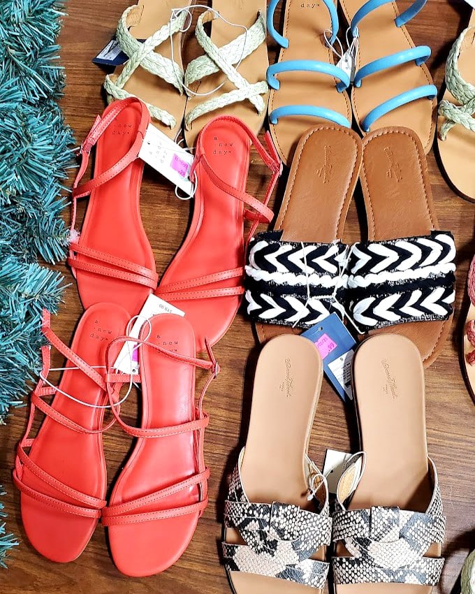 Summer's rainbow of sandals lined up like eager contestants in a beauty pageant where the grand prize is your closet.