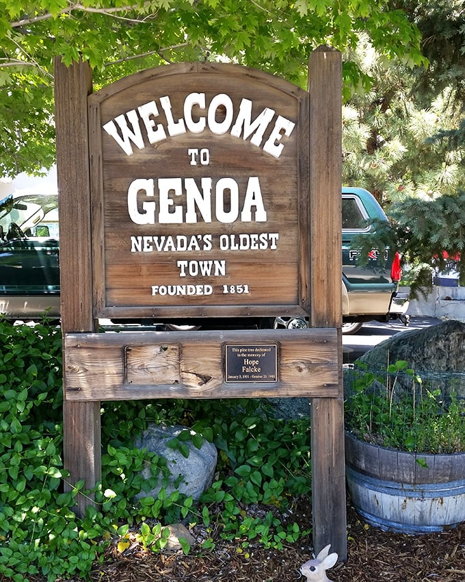 "Welcome to Genoa"—this weathered wooden sign doesn't just mark a location; it's the doorway to a 170-year journey through Nevada's past.