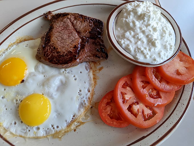 Steak and eggs: the power breakfast of champions. Those sunny-side up beauties could brighten even the cloudiest Iowa morning.