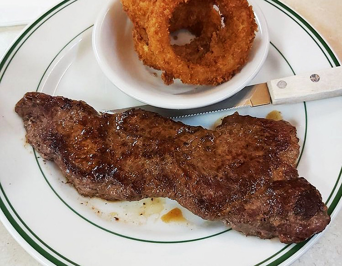 A steak and onion ring combo that answers the eternal question: "Why choose between land and fryer when you can have both?"