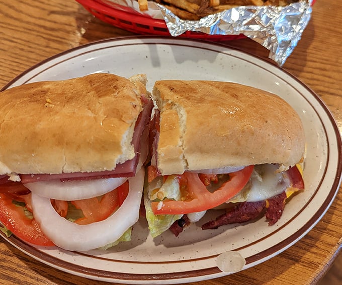 This sandwich isn't just stacked – it's architectural. Fresh veggies and hearty fillings create the skyscraper of sandwiches your lunch hour deserves.