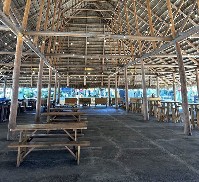 The market's thatched-roof dining pavilion offers a tropical respite where picnic tables invite you to rest weary feet and sample your culinary discoveries.