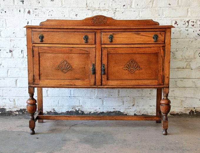 Craftsmanship that puts modern furniture to shame. Those hand-carved shell motifs weren't mass-produced in a factory—they were lovingly created by artisans.