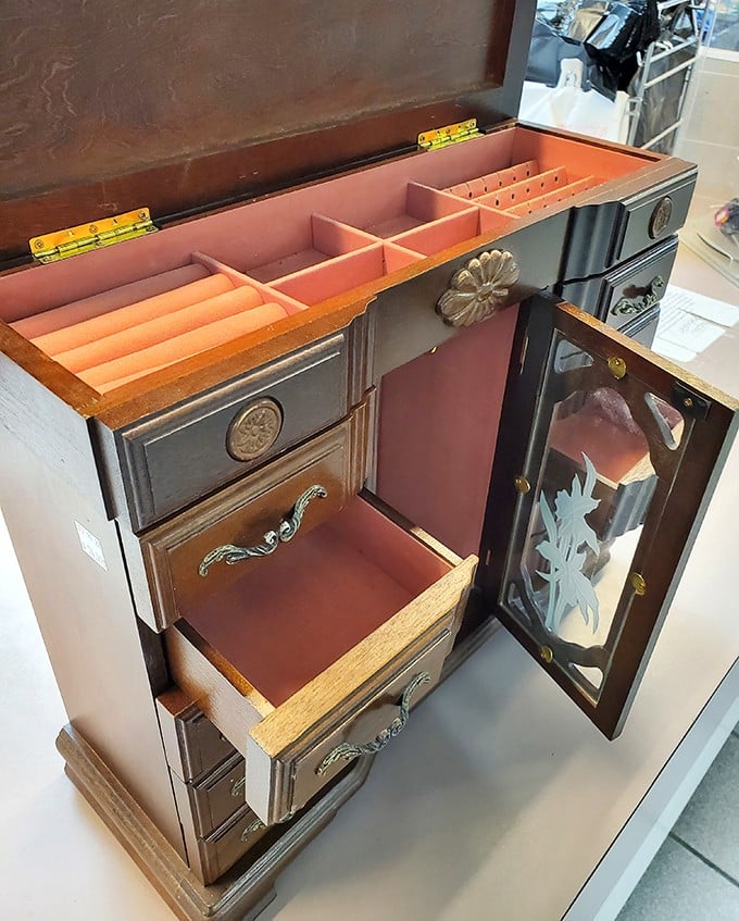 This isn't just a jewelry box – it's a miniature architectural marvel with secret compartments that would make James Bond jealous.