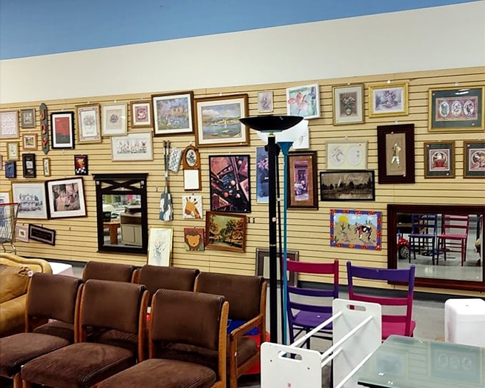 The wall of art resembles a museum curated by your eclectic aunt—desert landscapes, still lifes, and that one painting everyone comments on.