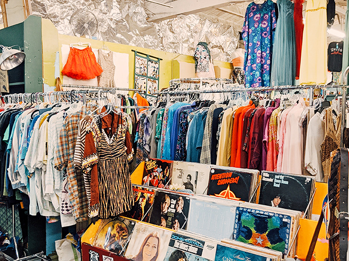 A rainbow of vintage textiles where every hue has a history. Records below, clothing above – a perfect Portland pairing like coffee and rain.