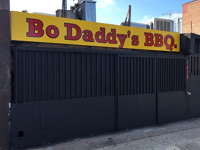 Bo Daddy's understated exterior hides downtown LA's BBQ treasure. That yellow sign is like a beacon for those seeking serious Southern smoke.