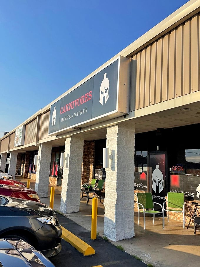 Carnivores' bold warrior helmet logo makes its mission clear—this place takes meat seriously. No frills, just thrills for steak enthusiasts.