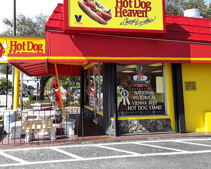 When your sign proclaims "Hot Dog Heaven," you better deliver divine dogs – and this cheerful red-roofed stand absolutely does.