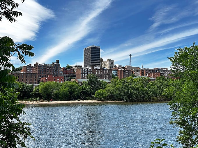 The James River reflects Lynchburg's skyline like nature's own mirror capturing urban beauty.