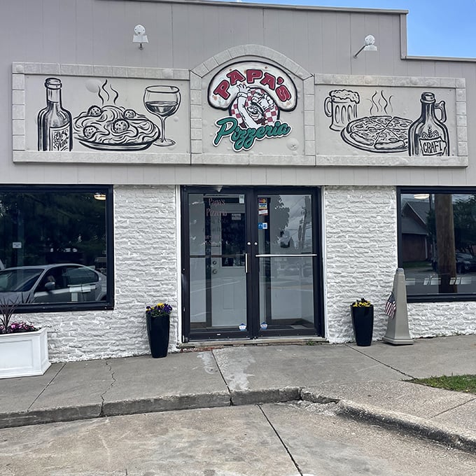 Papa's Pizzeria's cheerful storefront promises Italian comfort. That illustrated sign tells you they take pizza seriously – but not themselves.