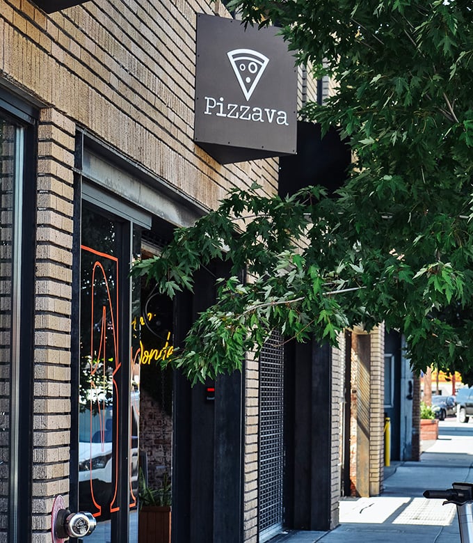 Minimalist brick exterior, maximalist flavor inside—the introvert of pizza places that's secretly the life of the party.