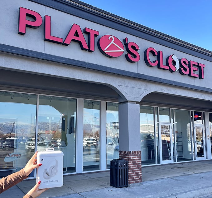 Plato's Closet's bold pink signage practically shouts "fashion finds ahead!" – like a runway for your wallet.