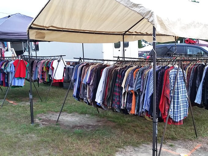 Rows of clothing dance in the breeze like colorful flags celebrating the joy of finding perfect deals.
