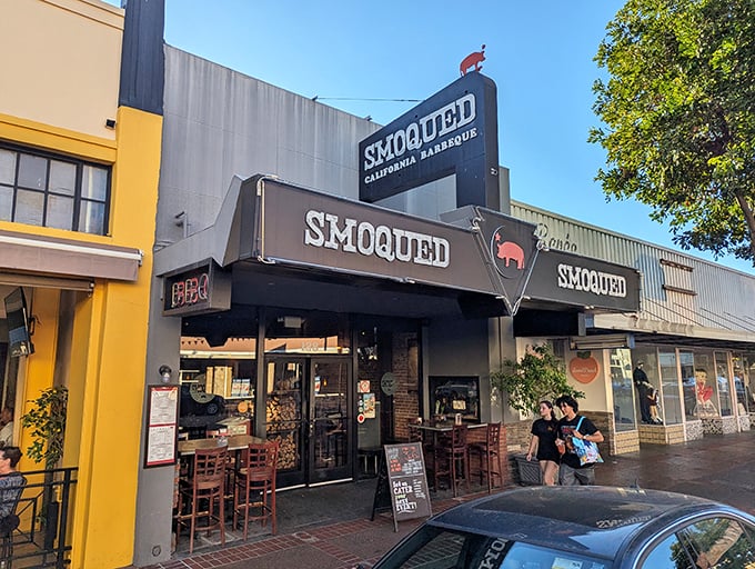 Smoqued's brick-lined entrance and stacked firewood tell you they mean business about their barbecue.