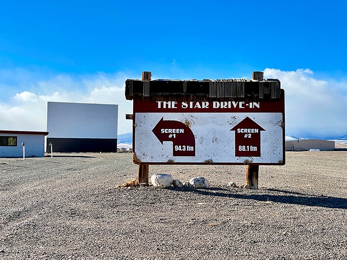 The Star Drive-In's weathered sign points the way to screens where generations of families have shared movie nights.