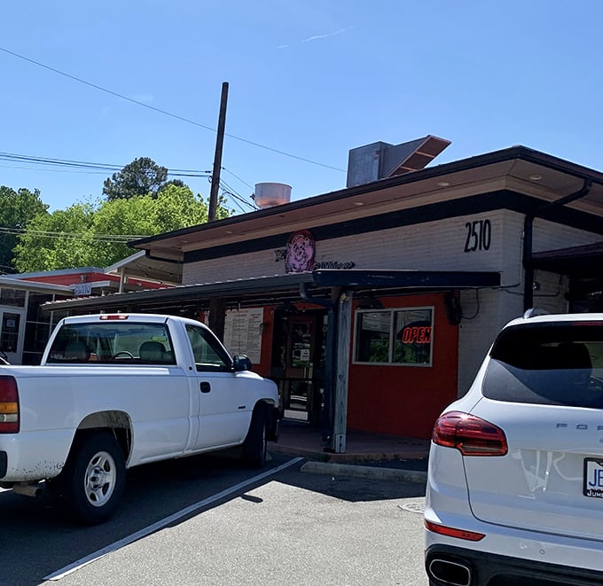 The Original Q Shack's pink exterior is as bold as its flavors – this Durham institution doesn't hide its personality.