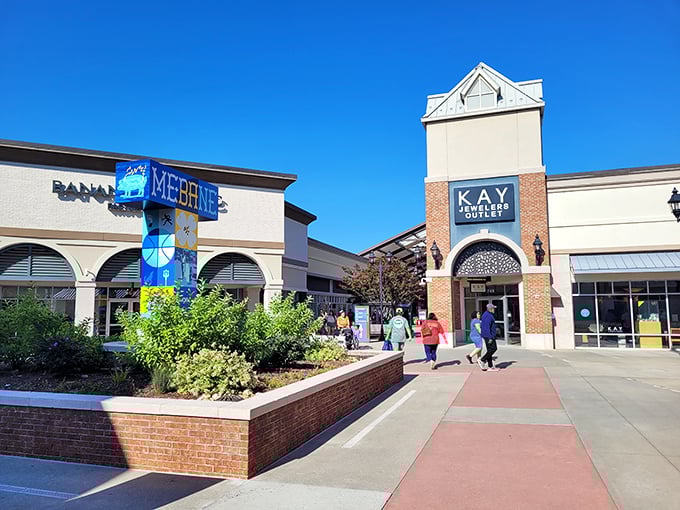 Mebane's Tanger tower—like a retail lighthouse guiding bargain hunters safely to shore.