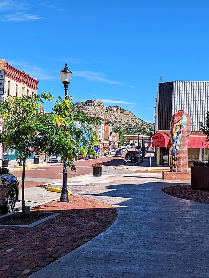 Main Street hospitality thrives where brick buildings house local businesses that remember your name and preferences.