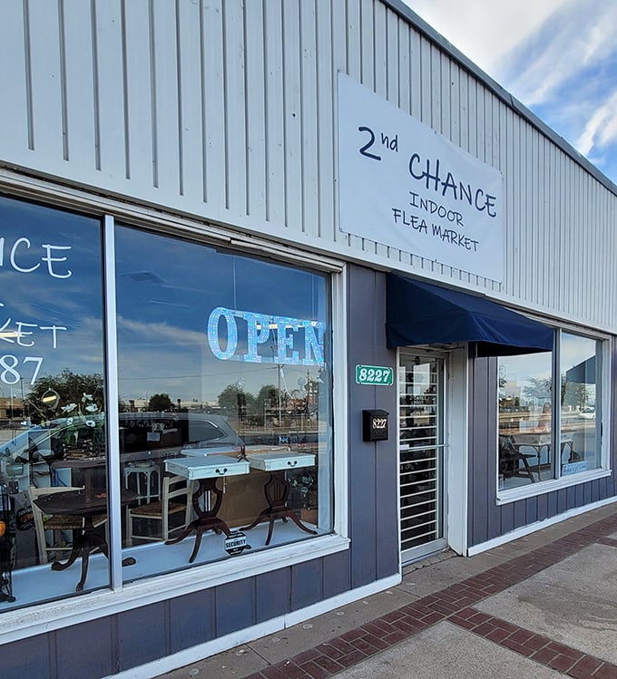 Blue neon beckons bargain lovers! 2nd Chance's windows reflect Arizona sky while promising indoor treasure hunting—like finding the perfect diner in a strange town.